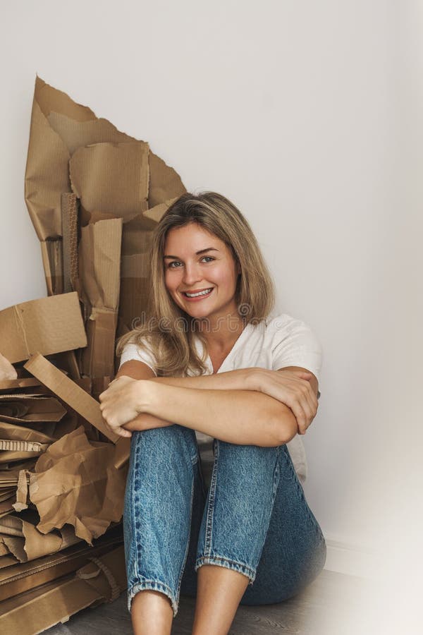 Young Woman Wand Stack of Cardboard Waste at Home. Concepts of Paper ...