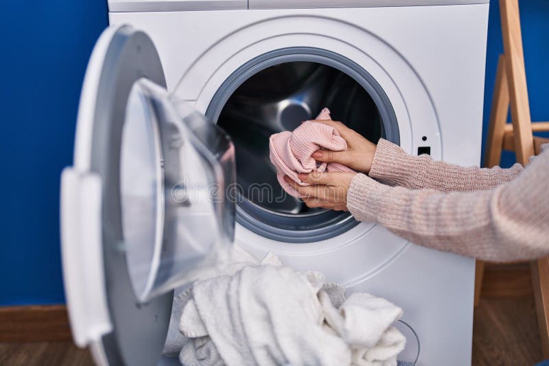 Young Woman Washing Clothes at Laundry Room Stock Photo - Image of ...