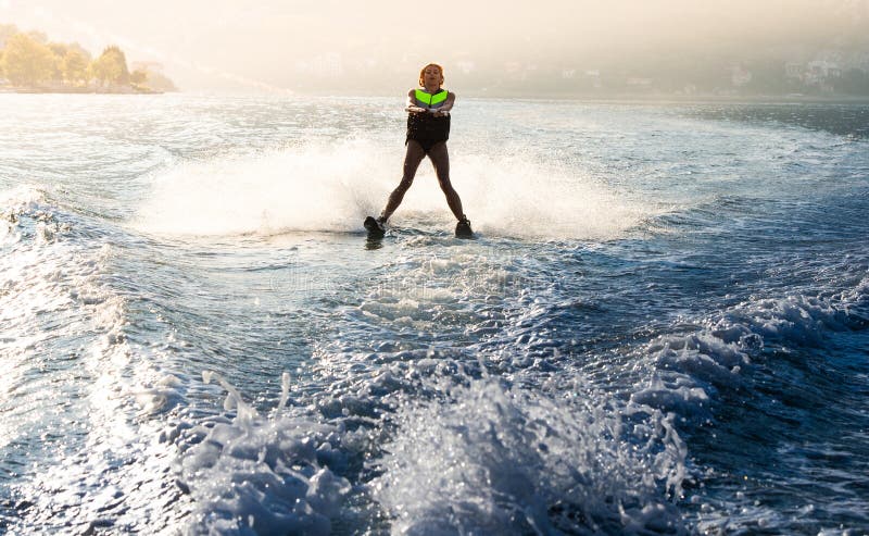 Water skiing on a sea stock photo. Image of delight - 303833906