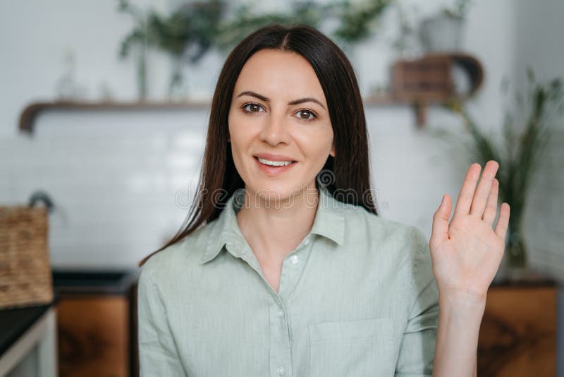 Young Woman Waving Hand Waving Hand Into Camera With A Smile Video