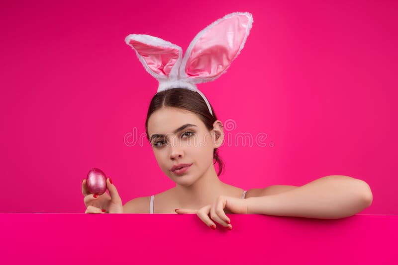 Pin Up Bunny Beautiful Blonde Girl With Bunny Ears And Easter Egg