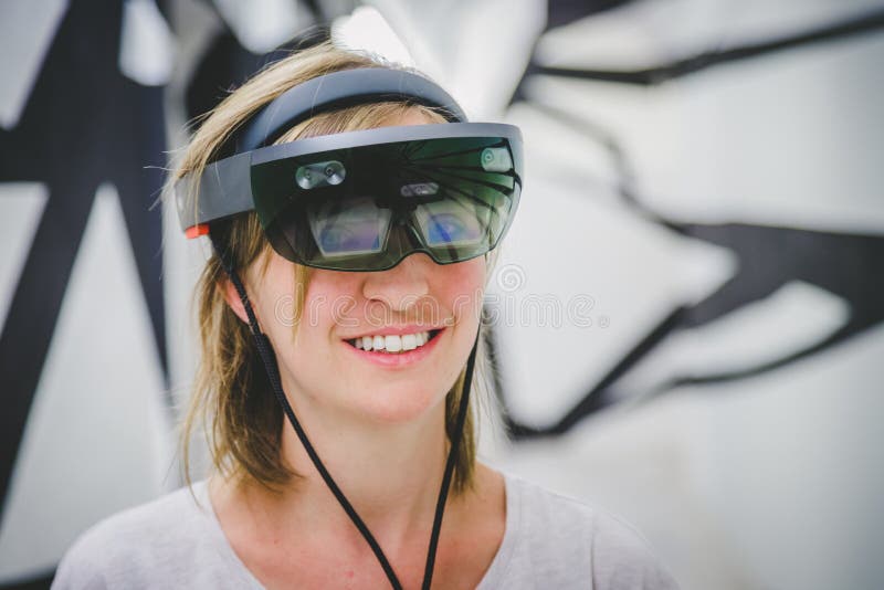 Young Woman Wearing High End Virtual Reality Glasses. Concept for VR ...