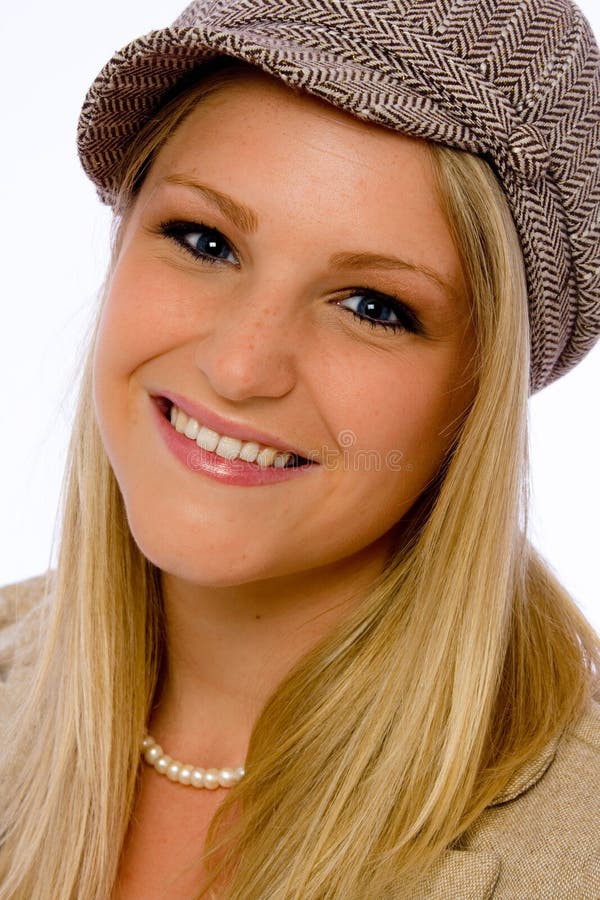 Young Woman Wearing Mod Cap Smiles at Camera Stock Image - Image of ...