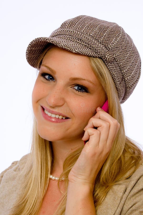 Young Woman Wearing Mod Cap Smiles at Camera Stock Photo - Image of ...