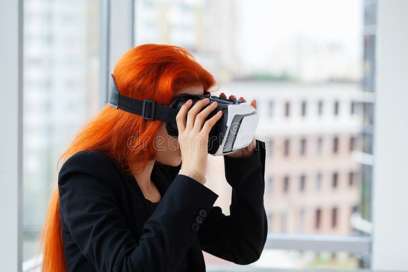 Young Woman Wearing Virtual Reality Goggles in Modern Coworking Studio ...