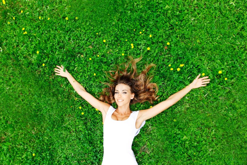 Young Woman In White Dress Lying On Grass Stock Image Image Of