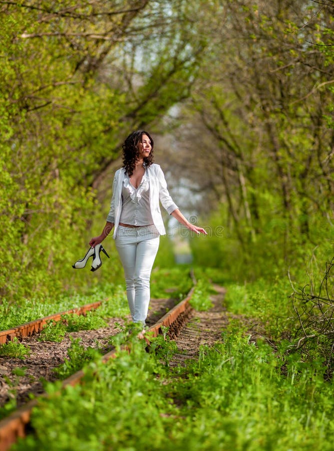 Young Woman in White on the Rails in Nature. Stock Image - Image of ...
