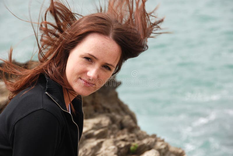 A young woman in the wind stock image. Image of nature - 9285067