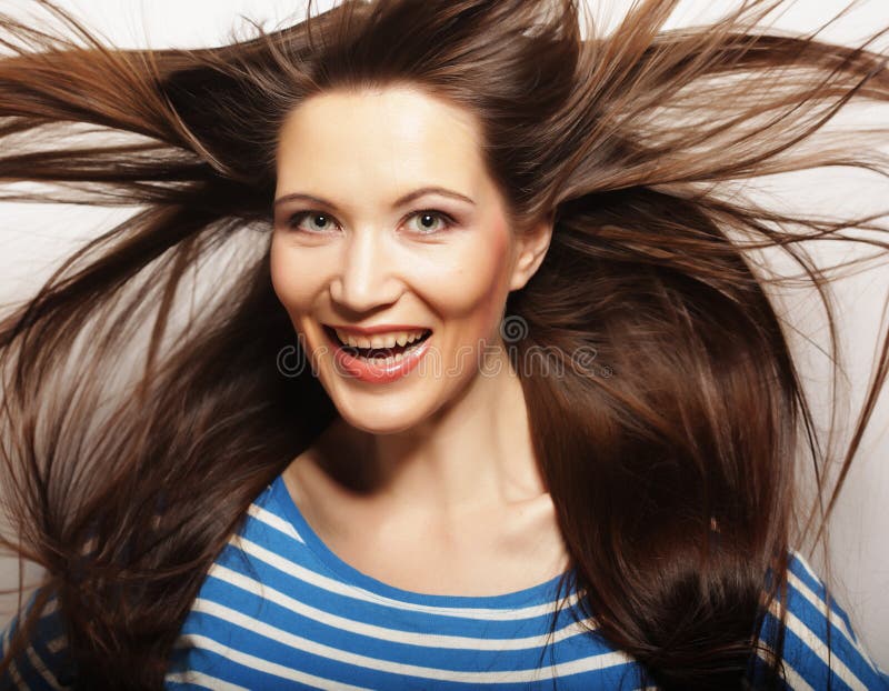Young Woman with Wind in Hair Stock Photo - Image of hairstyle ...