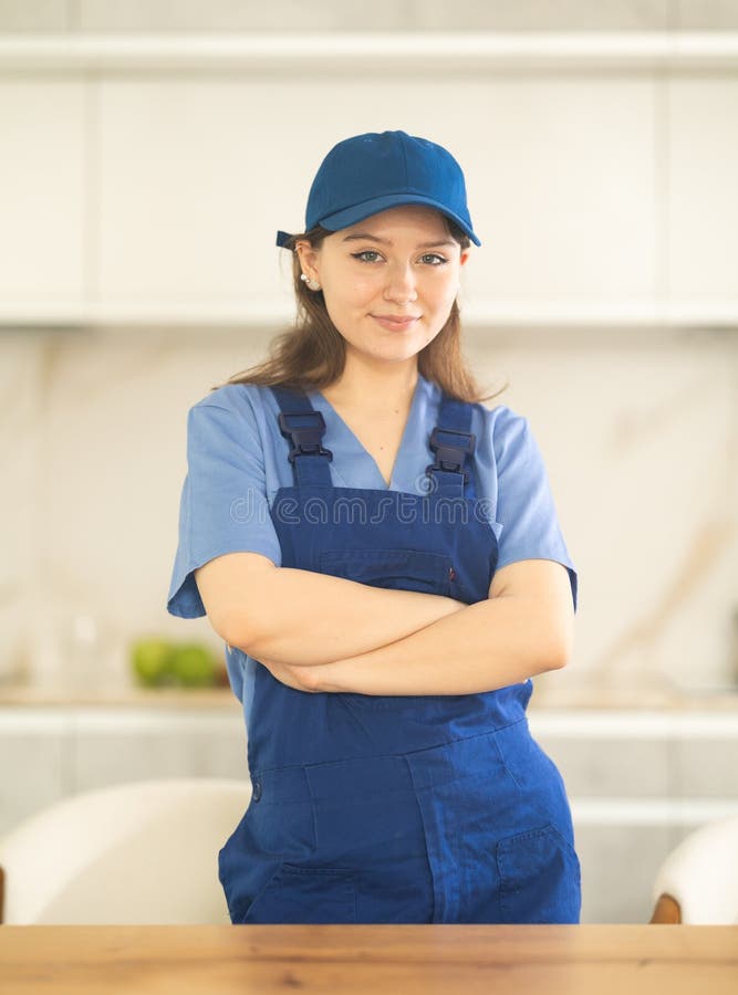 Young Woman Worker at Table in Kitchen Stock Image - Image of indoors ...