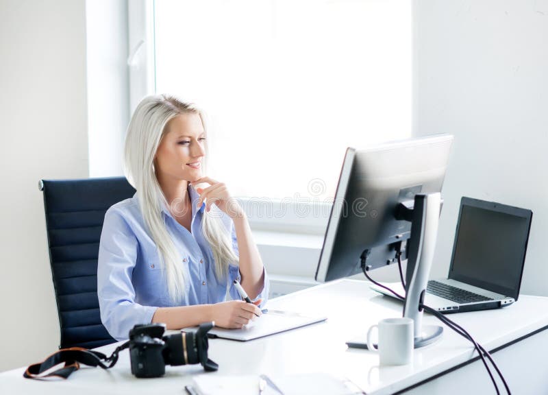Young Woman Working on the Computer in the Office Stock Photo - Image ...