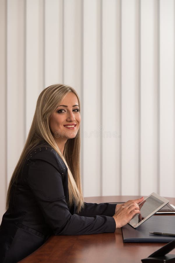 Young Woman Working on Computer in Office Stock Photo - Image of ...
