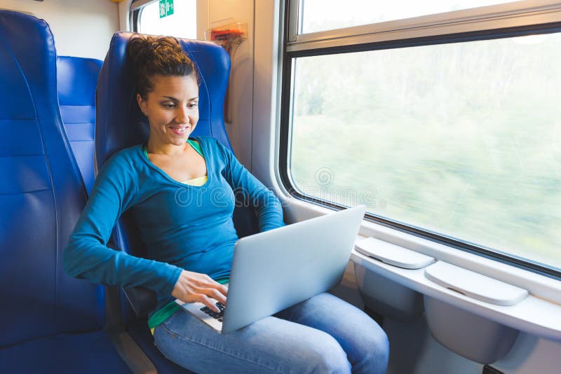 Young Woman Working with Computer on the Train Stock Image - Image of ...