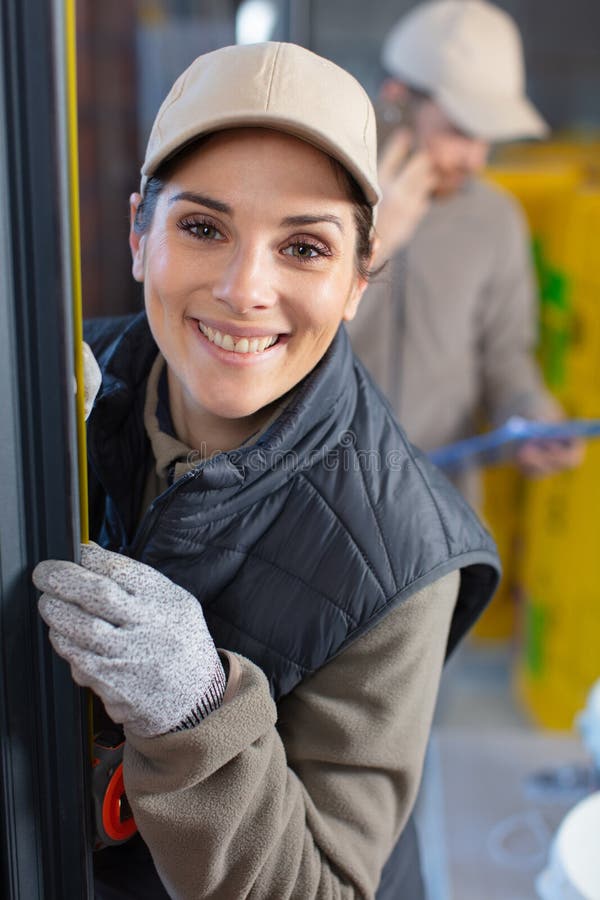 Young Woman Working Installing Windows Stock Photo - Image of ...