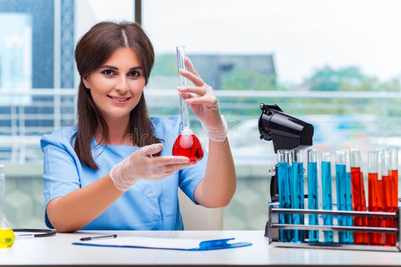 The Young Woman Working in the Laboratory Stock Image - Image of ...