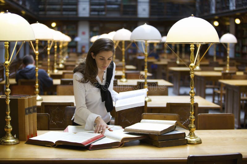 Young Woman Working in Library Stock Image - Image of learn, people ...