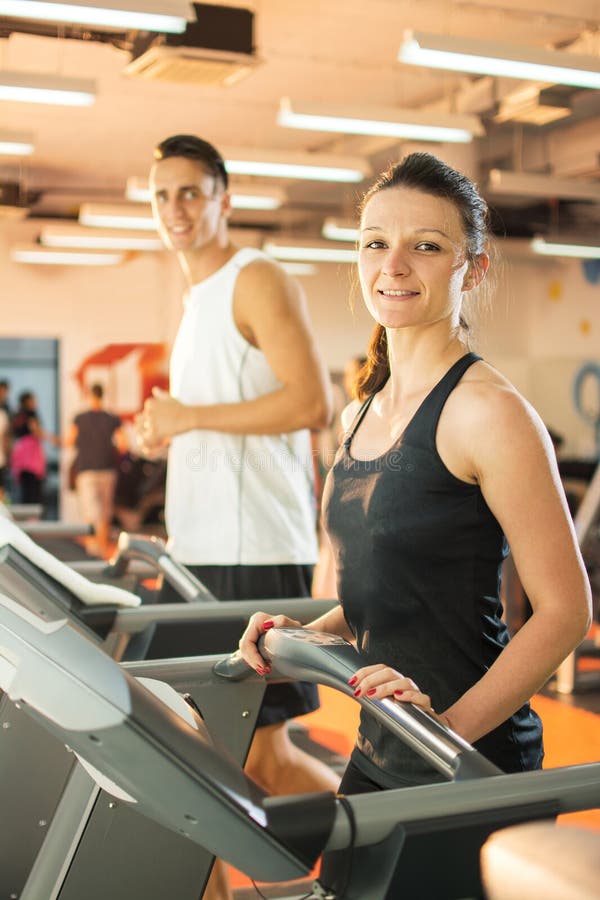 Young Woman Working Out in a Treadmill at the Gym Stock Photo - Image ...