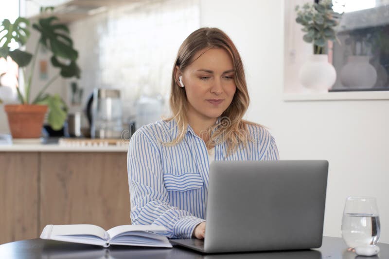 Young Woman Working Remotely Laptop Modern Kitchen Setting Stock Photos ...