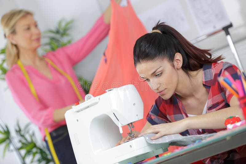 Young Woman Working with Sewing Machine Stock Photo - Image of hobby ...