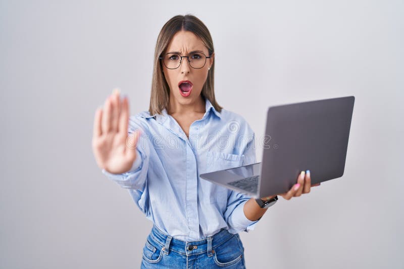 Young Woman Working Using Computer Laptop Doing Stop Gesture with Hands ...