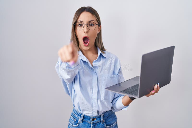 Young Woman Working Using Computer Laptop Pointing with Finger ...