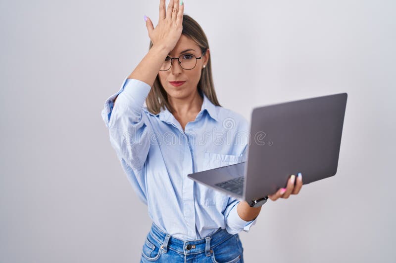 Young Woman Working Using Computer Laptop Surprised With Hand On Head