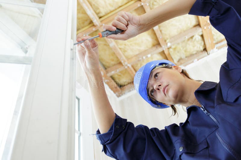 Young Woman Working on Window Stock Photo - Image of hard, precision ...