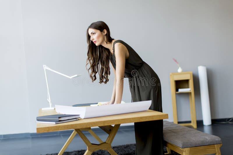 Young Woman Works on a Project Stock Image - Image of project, female ...
