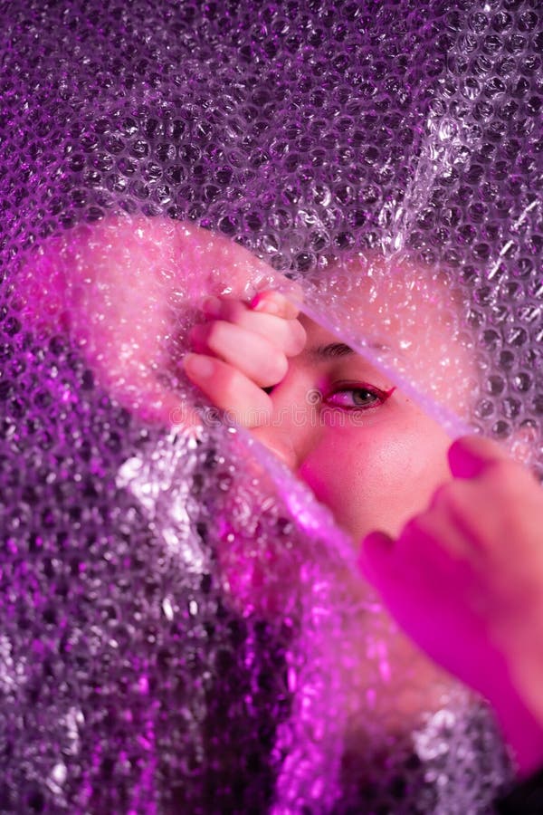 Woman Bubble Wrap Pink Lighting Stock Photos - Free & Royalty-Free ...