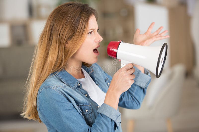 Woman Yelling into Microphone Stock Photo - Image of powerful, profile ...