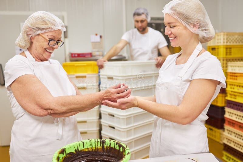 Baker Apprentice Bakes Chocolate Biscuits Under Supervision Stock Image ...