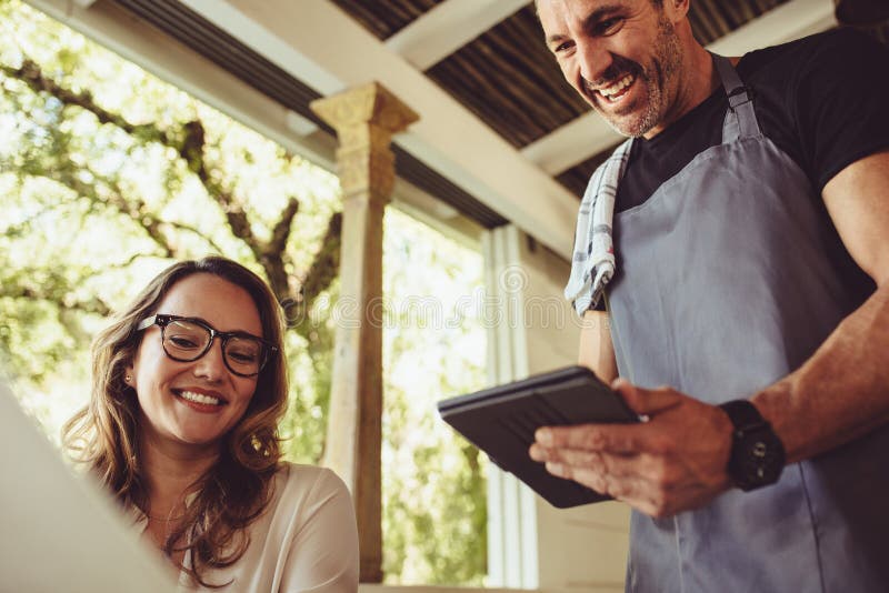 Woman in a Cafe Ordering from Menu Stock Photo - Image of tablet, shop ...