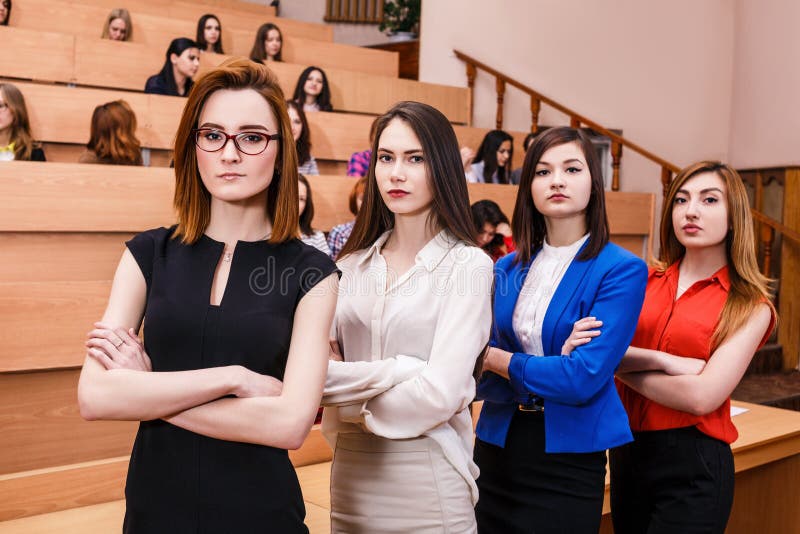 Young Women in Classroom with Students Stock Photo - Image of lesson ...