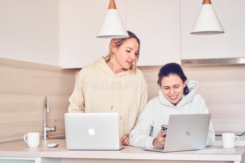 Young Women Discuss an Online Presentation, Work on a Joint Project ...