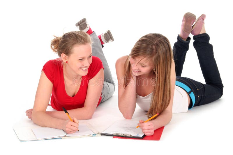 Young women doing homework stock image. Image of friendship - 4085371