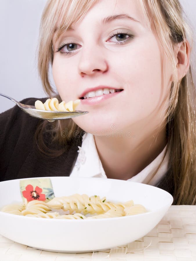 Young women eating soup stock image. Image of enjoyment - 3317915