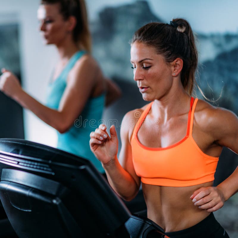 Women Exercising on Treadmill Stock Photo - Image of active, adult ...