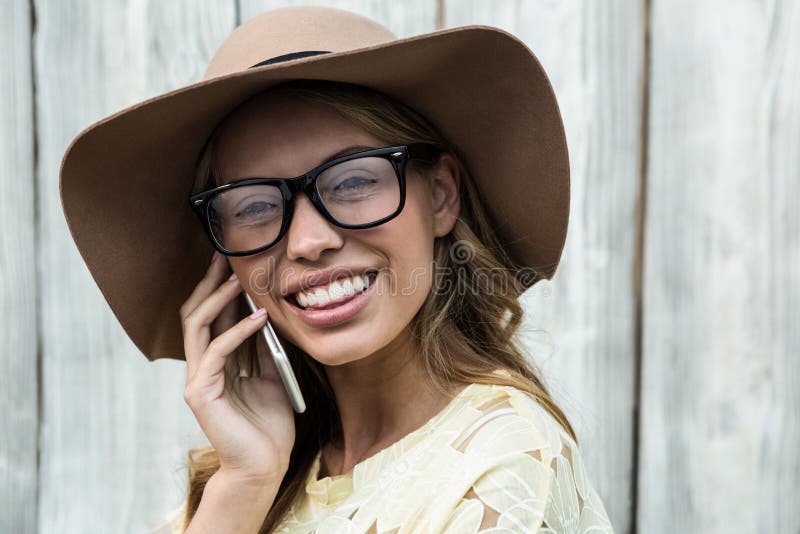 Young women facing camera stock image. Image of mobile - 65394805