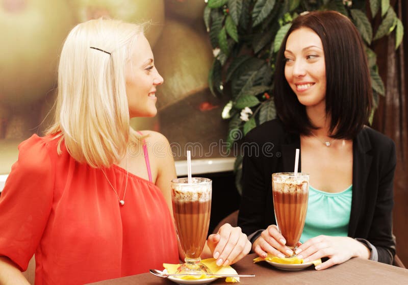 Young Women Having Coffee Break Together Stock Image - Image of ...
