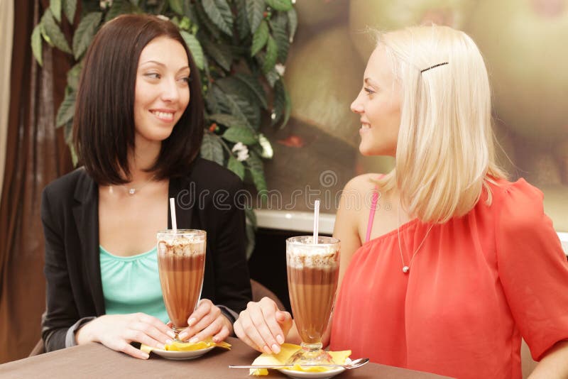 Young Women Having Coffee Break Together Stock Photo - Image of ...