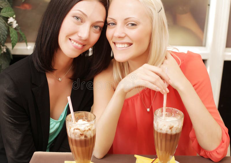 Young Women Having Coffee Break Together Stock Image - Image of ...