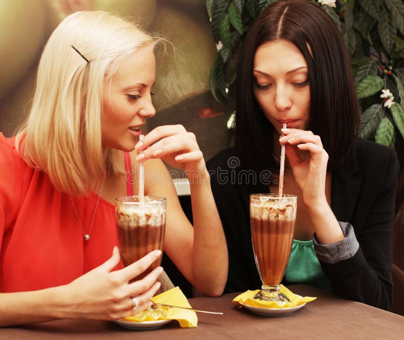 Young Women Having Coffee Break Together Stock Photo - Image of smiling ...