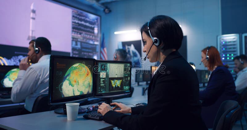 Flight Operator Using Computer during Spacecraft Launch Stock Photo ...