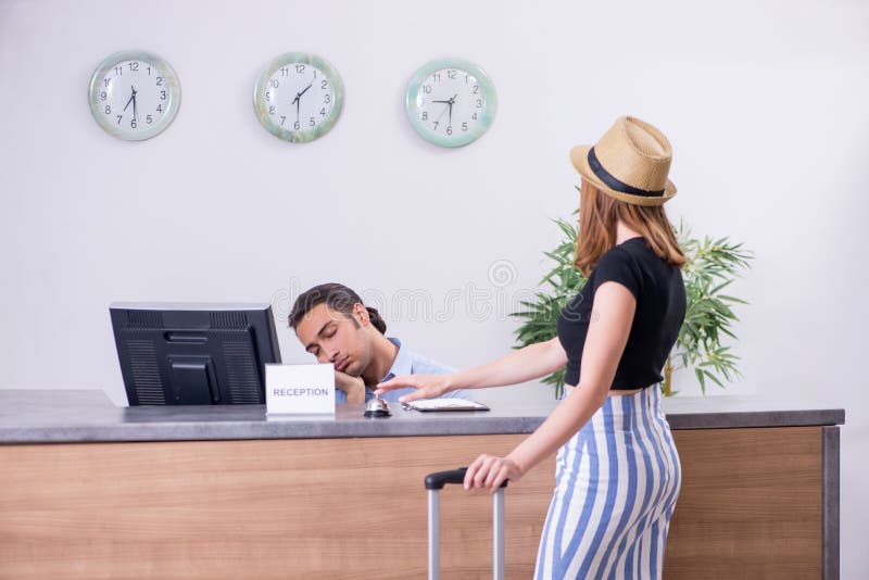 Young Woman at Hotel Reception Stock Image - Image of office, hotel ...