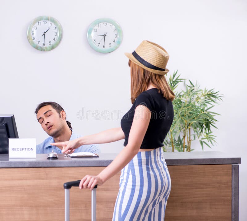 Young Woman at Hotel Reception Stock Image - Image of customer ...