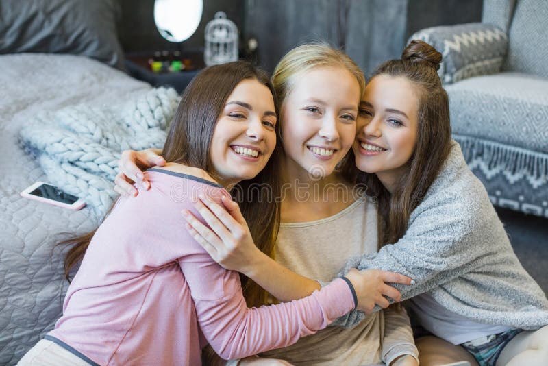 Young women hugging stock photo. Image of beauty, adult - 90346410
