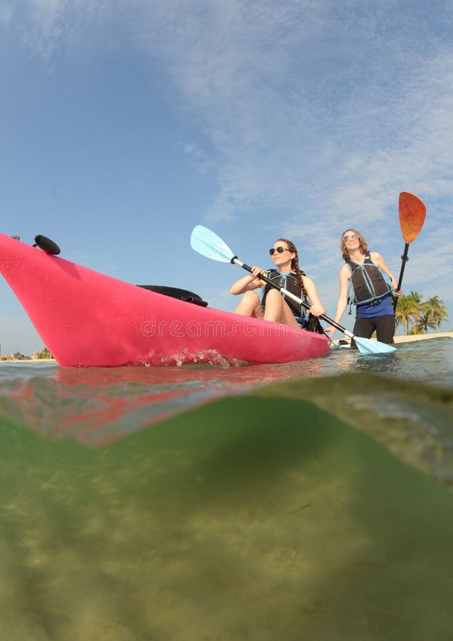 Two Young Women Smiling in Kayak Stock Photo - Image of girls ...