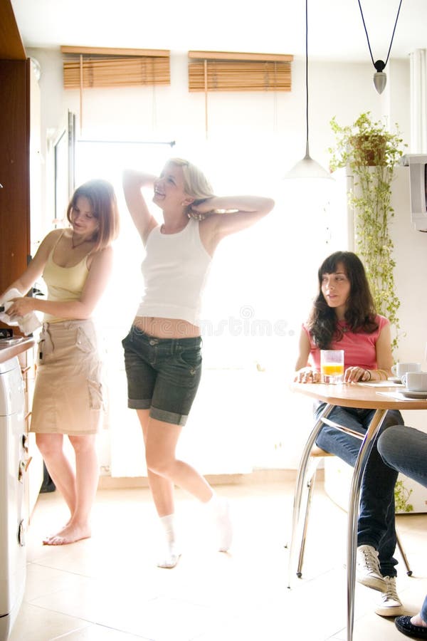 Young women in kitchen stock image. Image of table, relaxing - 2712133