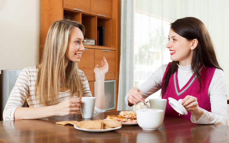 Young Women Table Gossiping and Drinking Tea Stock Image - Image of ...
