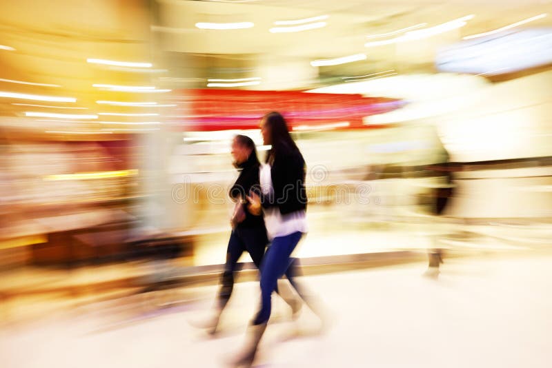 Young Women Walking Past Shop Window Stock Photos - Free & Royalty-Free ...